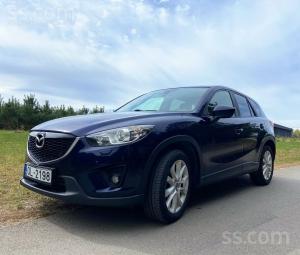Blue Mazda CX-5 2014 in Riga, with an engine capacity of 2.00 L and mileage of 305 thousand km for 7900 €, photo  on AUTOMOTO.COM.LV