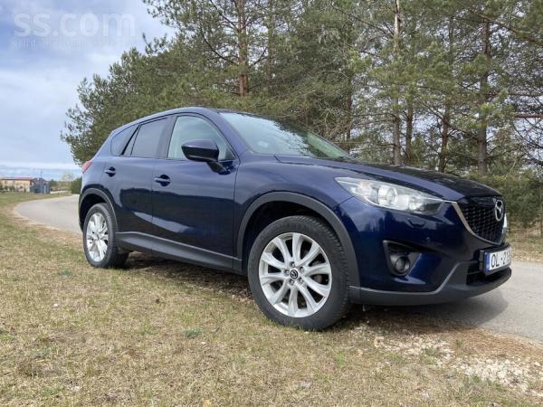 Zils Mazda CX-5 2014 Rīga, ar dzinēja tilpumu 2.00 L un nobraukumu 305 tūkst. km par 7900 €, foto 2 vietnē AUTOMOTO.COM.LV