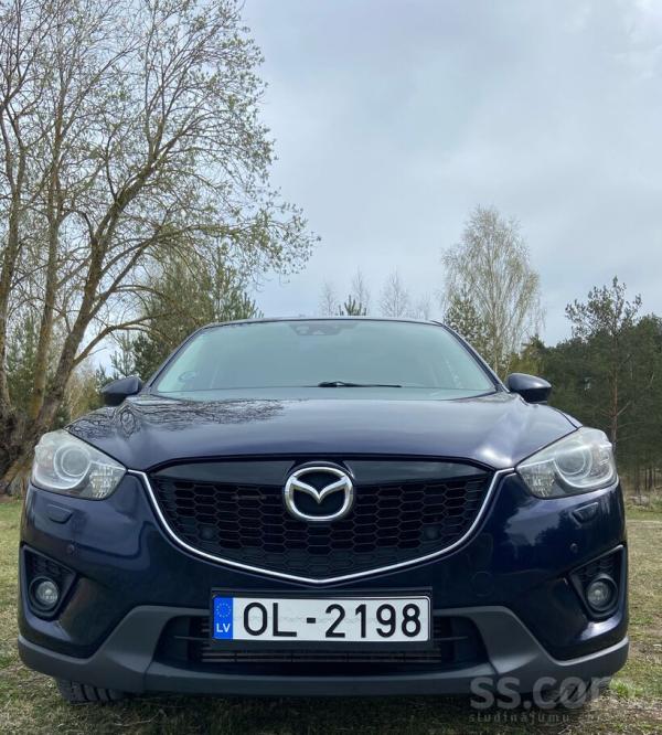 Zils Mazda CX-5 2014 Rīga, ar dzinēja tilpumu 2.00 L un nobraukumu 305 tūkst. km par 7900 €, foto 7 vietnē AUTOMOTO.COM.LV