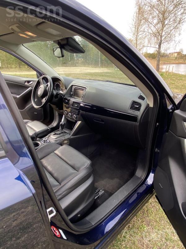Zils Mazda CX-5 2014 Rīga, ar dzinēja tilpumu 2.00 L un nobraukumu 305 tūkst. km par 7900 €, foto 10 vietnē AUTOMOTO.COM.LV