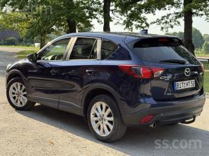 Zils Mazda CX-5 2014 Aizkraukle, ar dzinēja tilpumu 2.20 L un nobraukumu 166 tūkst. km par 6980 €, foto 3 vietnē AUTOMOTO.COM.LV
