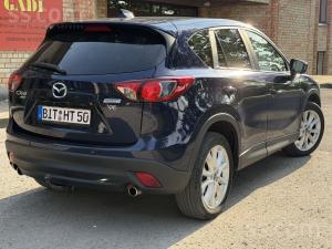 Zils Mazda CX-5 2014 Aizkraukle, ar dzinēja tilpumu 2.20 L un nobraukumu 166 tūkst. km par 6980 €, foto 4 vietnē AUTOMOTO.COM.LV