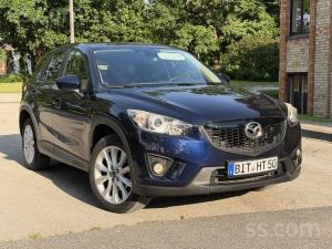 Zils Mazda CX-5 2014 Aizkraukle, ar dzinēja tilpumu 2.20 L un nobraukumu 166 tūkst. km par 6980 €, foto 18 vietnē AUTOMOTO.COM.LV