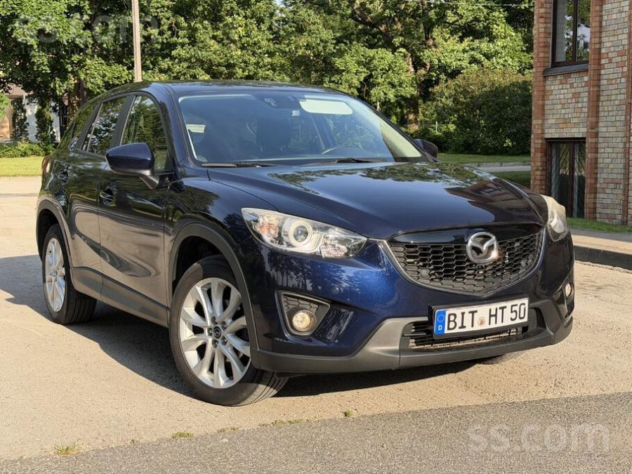 Zils Mazda CX-5 2014 Aizkraukle, ar dzinēja tilpumu 2.20 L un nobraukumu 166 tūkst. km par 6980 €, foto 18 vietnē AUTOMOTO.COM.LV
