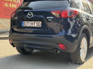 Zils Mazda CX-5 2014 Aizkraukle, ar dzinēja tilpumu 2.20 L un nobraukumu 166 tūkst. km par 6980 €, foto 19 vietnē AUTOMOTO.COM.LV