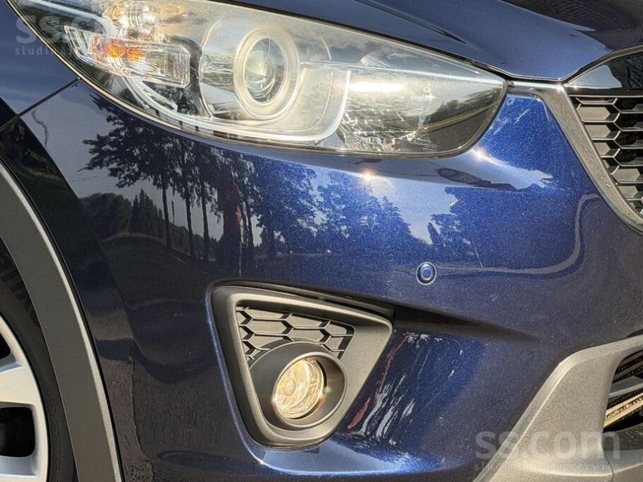 Zils Mazda CX-5 2014 Aizkraukle, ar dzinēja tilpumu 2.20 L un nobraukumu 166 tūkst. km par 6980 €, foto 20 vietnē AUTOMOTO.COM.LV