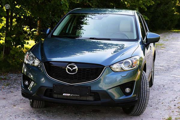 Blue Mazda CX-5 2014 in Kretinga, with an engine capacity of 2.19 L and mileage of 193 thousand km for 7999 €, photo 4 on AUTOMOTO.COM.LV
