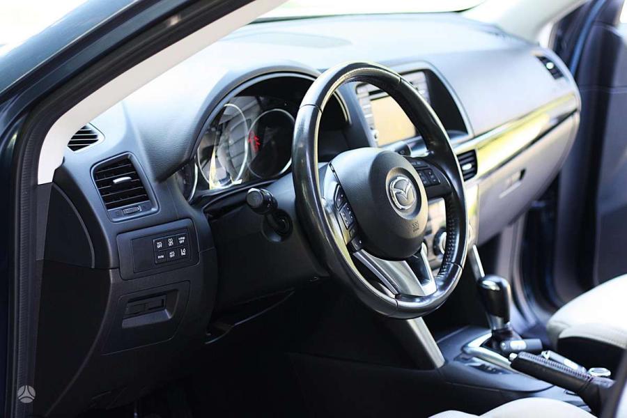 Zils Mazda CX-5 2014 Kretinga, ar dzinēja tilpumu 2.19 L un nobraukumu 193 tūkst. km par 7999 €, foto 18 vietnē AUTOMOTO.COM.LV