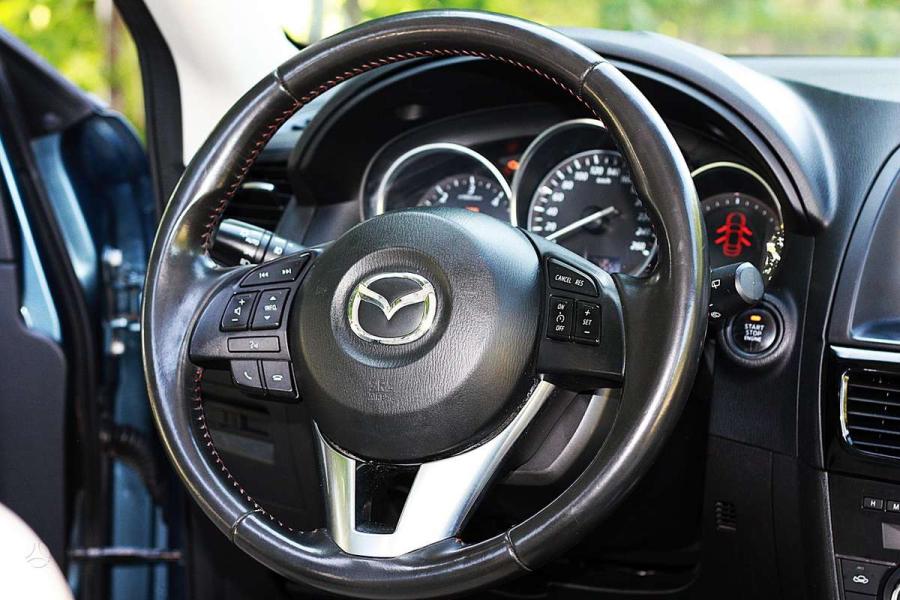 Zils Mazda CX-5 2014 Kretinga, ar dzinēja tilpumu 2.19 L un nobraukumu 193 tūkst. km par 7999 €, foto 33 vietnē AUTOMOTO.COM.LV