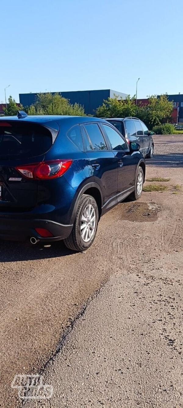 Blue Mazda CX-5 2014 in Siauliai, with an engine capacity of 2.20 L and mileage of 210 thousand km for 6500 €, photo 3 on AUTOMOTO.COM.LV