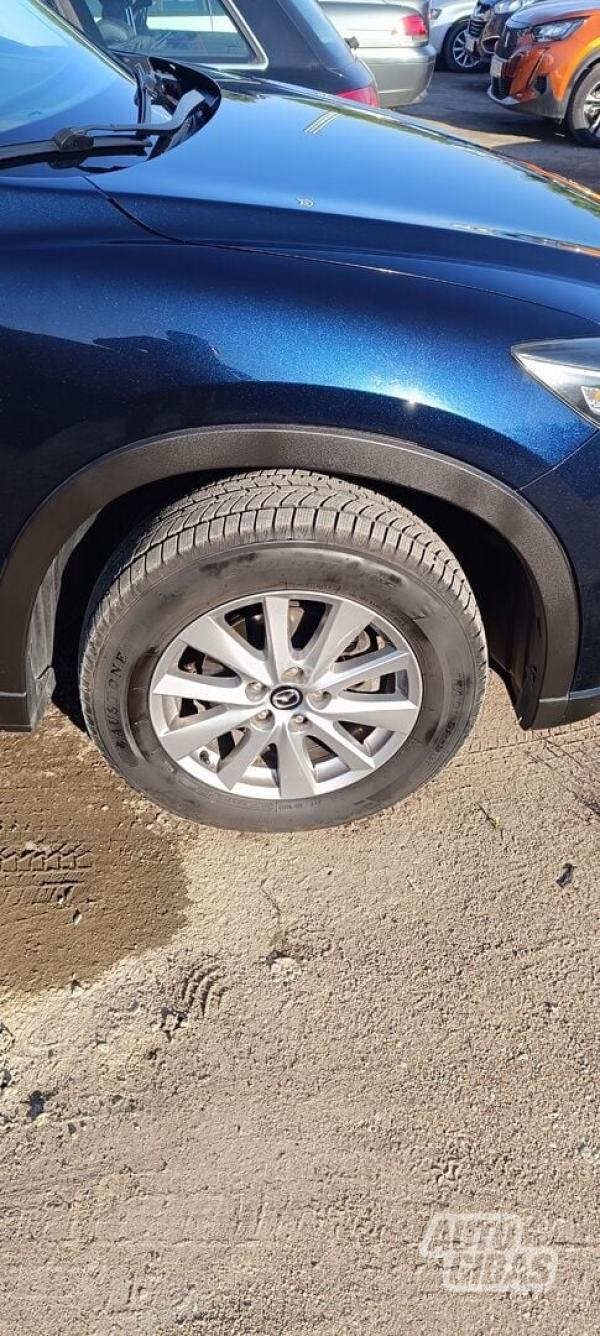 Blue Mazda CX-5 2014 in Siauliai, with an engine capacity of 2.20 L and mileage of 210 thousand km for 6500 €, photo 9 on AUTOMOTO.COM.LV
