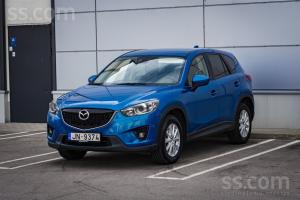 Blue Mazda CX-5 2014 in Riga, with an engine capacity of 2.00 L and mileage of 224 thousand km for 6750 €, photo  on AUTOMOTO.COM.LV
