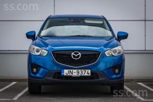 Blue Mazda CX-5 2014 in Riga, with an engine capacity of 2.00 L and mileage of 224 thousand km for 6750 €, photo 3 on AUTOMOTO.COM.LV