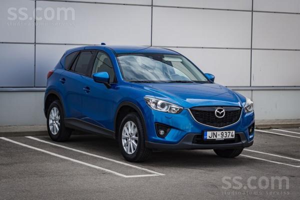 Blue Mazda CX-5 2014 in Riga, with an engine capacity of 2.00 L and mileage of 224 thousand km for 6750 €, photo 3 on AUTOMOTO.COM.LV