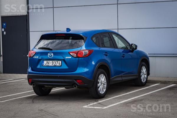 Blue Mazda CX-5 2014 in Riga, with an engine capacity of 2.00 L and mileage of 224 thousand km for 6750 €, photo 4 on AUTOMOTO.COM.LV
