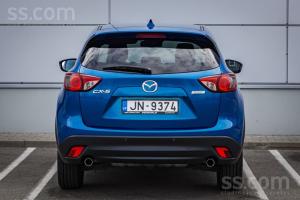 Blue Mazda CX-5 2014 in Riga, with an engine capacity of 2.00 L and mileage of 224 thousand km for 6750 €, photo 6 on AUTOMOTO.COM.LV