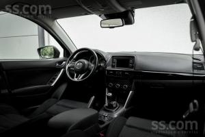 Blue Mazda CX-5 2014 in Riga, with an engine capacity of 2.00 L and mileage of 224 thousand km for 6750 €, photo 16 on AUTOMOTO.COM.LV