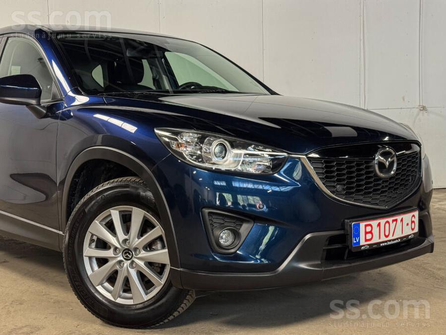 Blue Mazda CX-5 2014 in Jurmala, with an engine capacity of 2.00 L and mileage of 235 thousand km for 9750 €, photo 6 on AUTOMOTO.COM.LV
