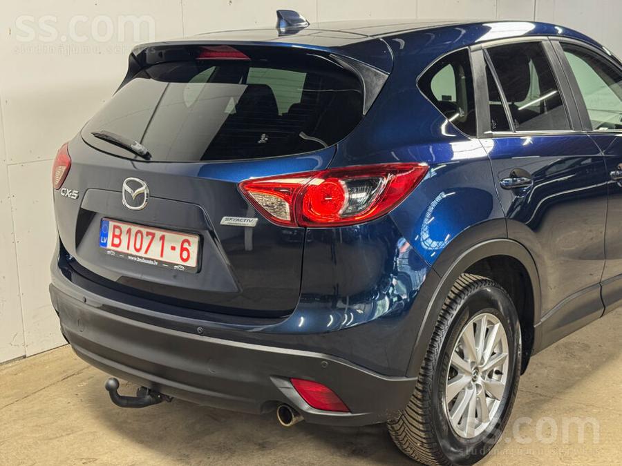 Blue Mazda CX-5 2014 in Jurmala, with an engine capacity of 2.00 L and mileage of 235 thousand km for 9750 €, photo 13 on AUTOMOTO.COM.LV