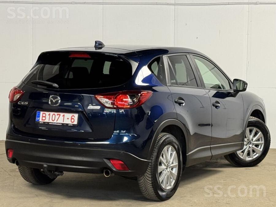 Blue Mazda CX-5 2014 in Jurmala, with an engine capacity of 2.00 L and mileage of 235 thousand km for 9750 €, photo 15 on AUTOMOTO.COM.LV