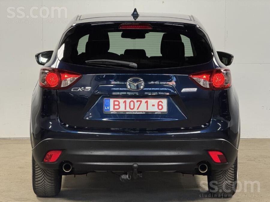 Blue Mazda CX-5 2014 in Jurmala, with an engine capacity of 2.00 L and mileage of 235 thousand km for 9750 €, photo 16 on AUTOMOTO.COM.LV