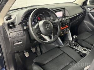 Blue Mazda CX-5 2014 in Jurmala, with an engine capacity of 2.00 L and mileage of 235 thousand km for 9750 €, photo 17 on AUTOMOTO.COM.LV
