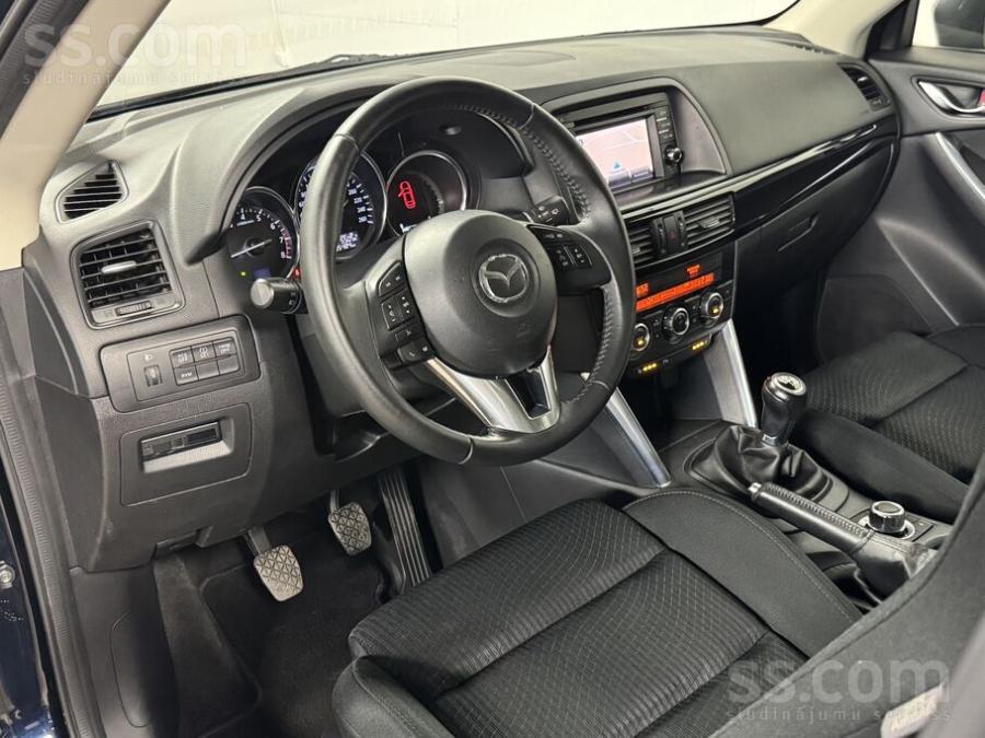 Blue Mazda CX-5 2014 in Jurmala, with an engine capacity of 2.00 L and mileage of 235 thousand km for 9750 €, photo 17 on AUTOMOTO.COM.LV