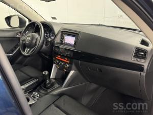 Blue Mazda CX-5 2014 in Jurmala, with an engine capacity of 2.00 L and mileage of 235 thousand km for 9750 €, photo 19 on AUTOMOTO.COM.LV