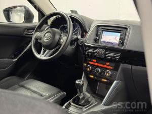 Blue Mazda CX-5 2014 in Jurmala, with an engine capacity of 2.00 L and mileage of 235 thousand km for 9750 €, photo 23 on AUTOMOTO.COM.LV