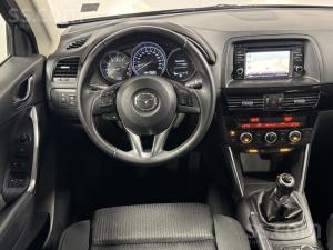 Blue Mazda CX-5 2014 in Jurmala, with an engine capacity of 2.00 L and mileage of 235 thousand km for 9750 €, photo 24 on AUTOMOTO.COM.LV