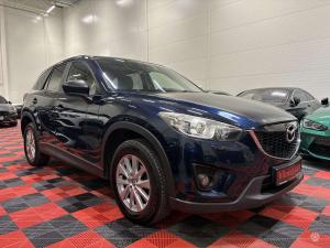 Blue Mazda CX-5 2014 in Vilnius, with an engine capacity of 2.19 L and mileage of 168 thousand km for 7490 €, photo 4 on AUTOMOTO.COM.LV