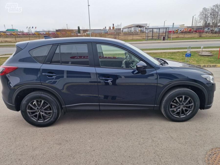 Zils Mazda CX-5 2015 Kretinga, ar dzinēja tilpumu 2.20 L un nobraukumu 164 tūkst. km par 6900 €, foto 10 vietnē AUTOMOTO.COM.LV