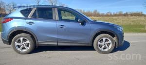 Zils Mazda CX-5 2015 Liepāja, ar dzinēja tilpumu 2.20 L un nobraukumu 204 tūkst. km par 7500 €, foto 9 vietnē AUTOMOTO.COM.LV