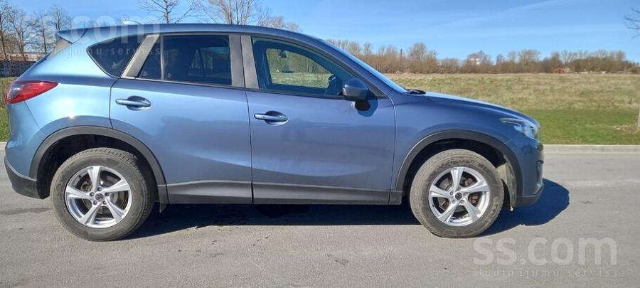 Zils Mazda CX-5 2015 Liepāja, ar dzinēja tilpumu 2.20 L un nobraukumu 204 tūkst. km par 7500 €, foto 9 vietnē AUTOMOTO.COM.LV