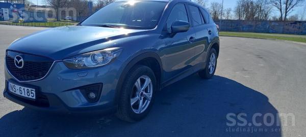Zils Mazda CX-5 2015 Liepāja, ar dzinēja tilpumu 2.20 L un nobraukumu 204 tūkst. km par 7500 €, foto 3 vietnē AUTOMOTO.COM.LV