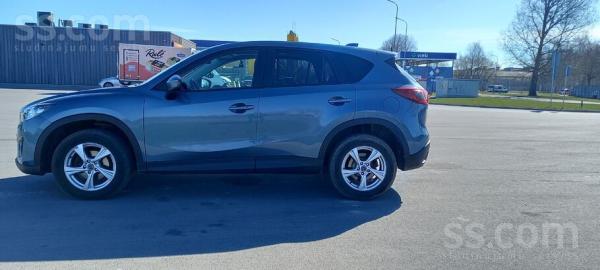 Zils Mazda CX-5 2015 Liepāja, ar dzinēja tilpumu 2.20 L un nobraukumu 204 tūkst. km par 7500 €, foto 4 vietnē AUTOMOTO.COM.LV