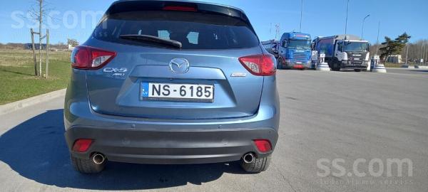 Zils Mazda CX-5 2015 Liepāja, ar dzinēja tilpumu 2.20 L un nobraukumu 204 tūkst. km par 7500 €, foto 6 vietnē AUTOMOTO.COM.LV