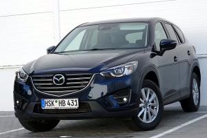 Blue Mazda CX-5 2015 in Riga, with an engine capacity of 2.20 L and mileage of 165 thousand km for 7500 €, photo 5 on AUTOMOTO.COM.LV