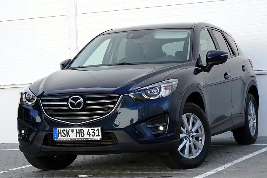 Blue Mazda CX-5 2015 in Riga, with an engine capacity of 2.20 L and mileage of 165 thousand km for 7500 €, photo 5 on AUTOMOTO.COM.LV