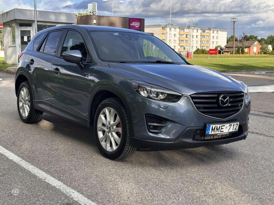 Zils Mazda CX-5 2015 Jonava, ar dzinēja tilpumu 2.19 L un nobraukumu 287 tūkst. km par 8999 €, foto 16 vietnē AUTOMOTO.COM.LV