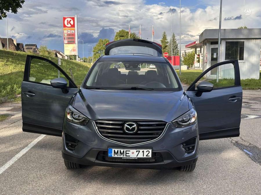 Zils Mazda CX-5 2015 Jonava, ar dzinēja tilpumu 2.19 L un nobraukumu 287 tūkst. km par 8999 €, foto 19 vietnē AUTOMOTO.COM.LV