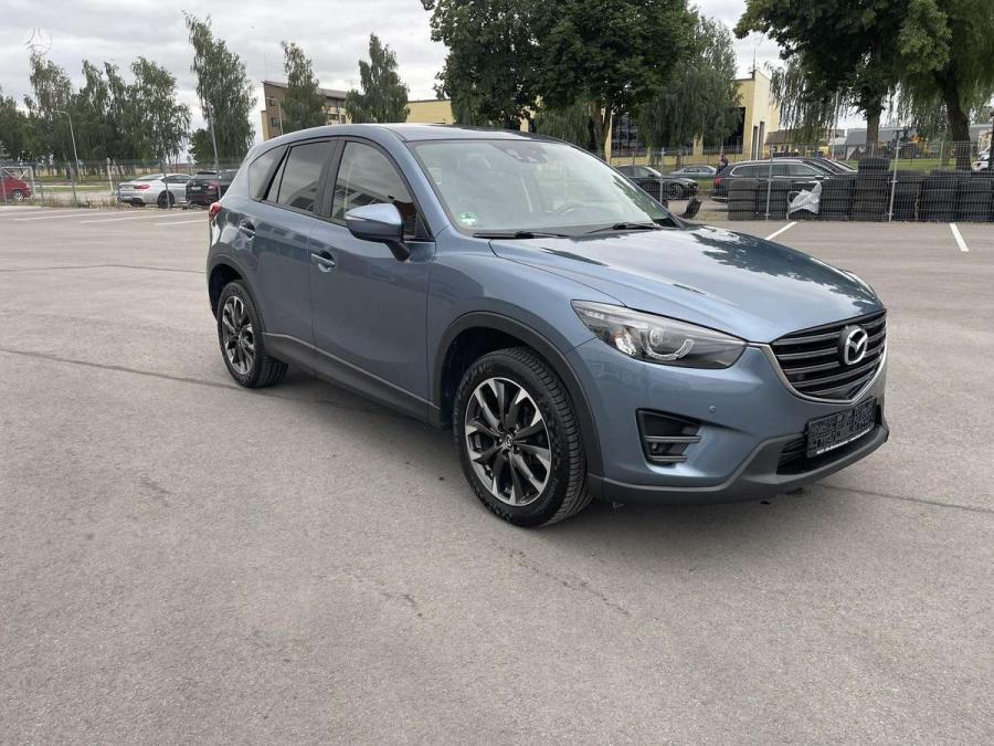 Blue Mazda CX-5 2015 in Marijampole, with an engine capacity of 2.19 L and mileage of 187 thousand km for 7800 €, photo 4 on AUTOMOTO.COM.LV