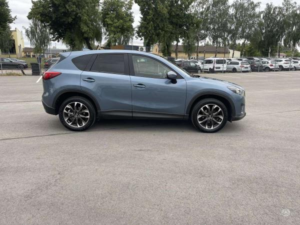 Blue Mazda CX-5 2015 in Marijampole, with an engine capacity of 2.19 L and mileage of 187 thousand km for 7800 €, photo 4 on AUTOMOTO.COM.LV