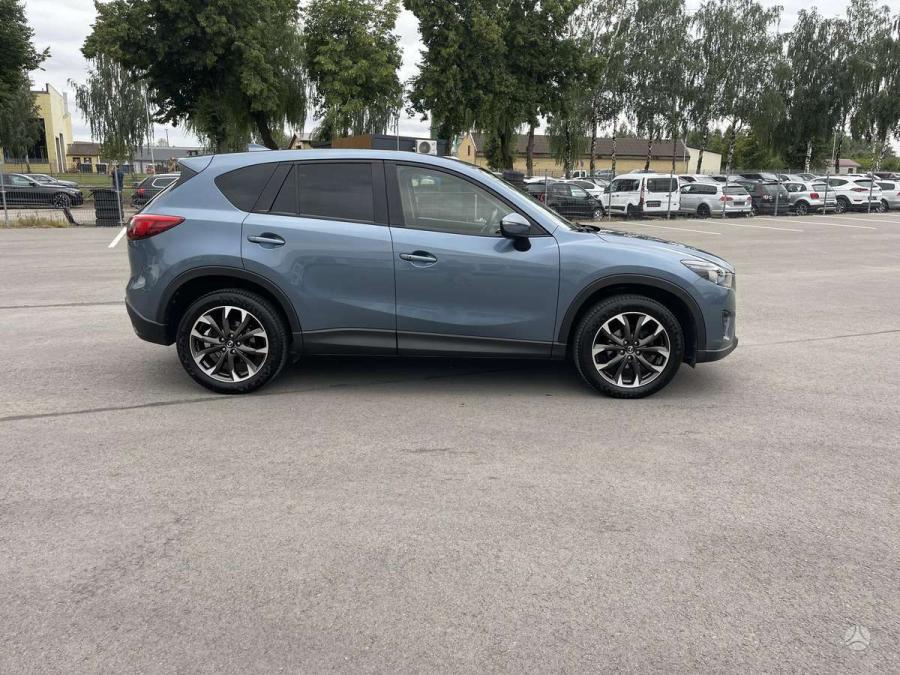 Blue Mazda CX-5 2015 in Marijampole, with an engine capacity of 2.19 L and mileage of 187 thousand km for 7800 €, photo 5 on AUTOMOTO.COM.LV