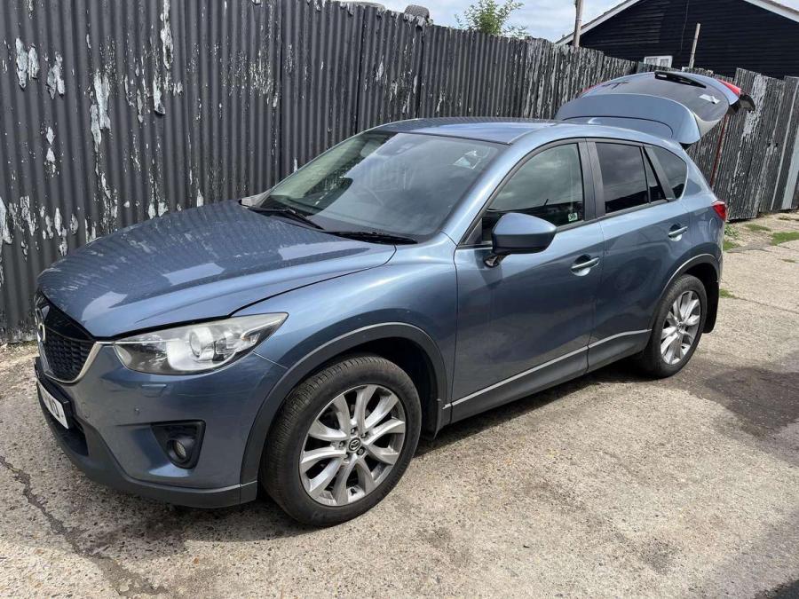 Blue Mazda CX-5 2015 in Kaunas, with an engine capacity of 2.19 L and mileage of 200 thousand km for 900 €, photo 3 on AUTOMOTO.COM.LV
