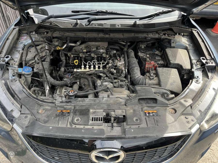 Blue Mazda CX-5 2015 in Kaunas, with an engine capacity of 2.19 L and mileage of 200 thousand km for 900 €, photo 13 on AUTOMOTO.COM.LV
