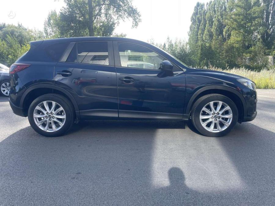 Zils Mazda CX-5 2015 Panevēža, ar dzinēja tilpumu 2.19 L un nobraukumu 177 tūkst. km par 8150 €, foto 5 vietnē AUTOMOTO.COM.LV