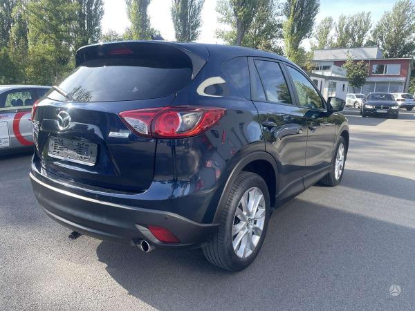 Zils Mazda CX-5 2015 Panevēža, ar dzinēja tilpumu 2.19 L un nobraukumu 177 tūkst. km par 8150 €, foto 6 vietnē AUTOMOTO.COM.LV
