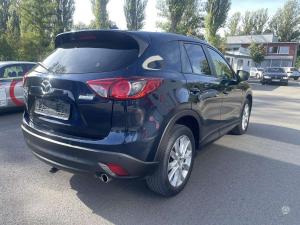 Zils Mazda CX-5 2015 Panevēža, ar dzinēja tilpumu 2.19 L un nobraukumu 177 tūkst. km par 8150 €, foto 6 vietnē AUTOMOTO.COM.LV
