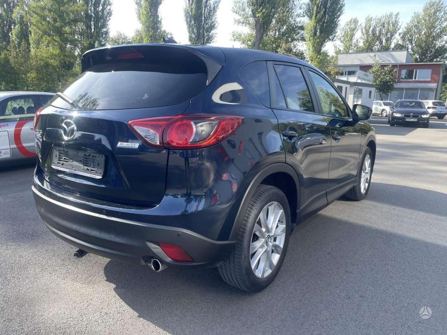 Zils Mazda CX-5 2015 Panevēža, ar dzinēja tilpumu 2.19 L un nobraukumu 177 tūkst. km par 8150 €, foto 6 vietnē AUTOMOTO.COM.LV